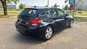Black BMW 116 2012 in Kaunas, with an engine capacity of 2.00 L and mileage of 211 thousand km for 5200 €, photo 8 on AUTOMOTO.COM.LV