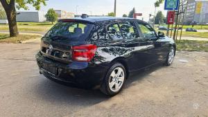 Black BMW 116 2012 in Kaunas, with an engine capacity of 2.00 L and mileage of 211 thousand km for 5200 €, photo 9 on AUTOMOTO.COM.LV