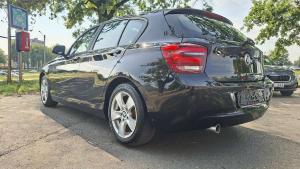 Black BMW 116 2012 in Kaunas, with an engine capacity of 2.00 L and mileage of 211 thousand km for 5200 €, photo 13 on AUTOMOTO.COM.LV