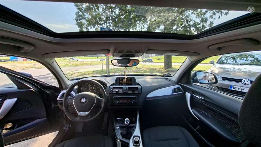 Black BMW 116 2012 in Kaunas, with an engine capacity of 2.00 L and mileage of 211 thousand km for 5200 €, photo 18 on AUTOMOTO.COM.LV