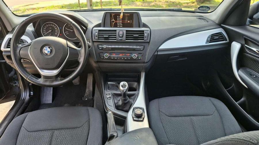 Black BMW 116 2012 in Kaunas, with an engine capacity of 2.00 L and mileage of 211 thousand km for 5200 €, photo 19 on AUTOMOTO.COM.LV
