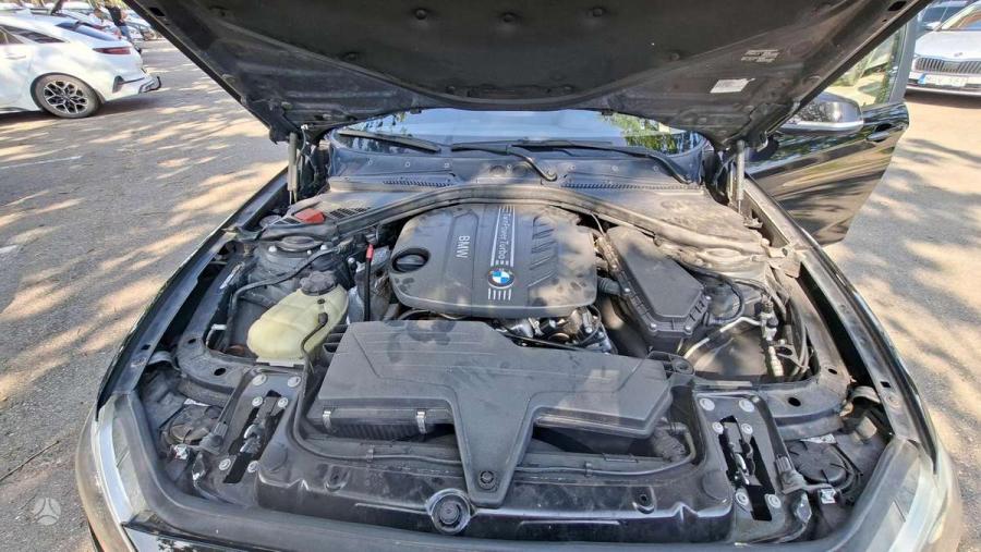 Black BMW 116 2012 in Kaunas, with an engine capacity of 2.00 L and mileage of 211 thousand km for 5200 €, photo 28 on AUTOMOTO.COM.LV