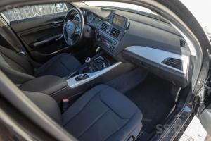 Black BMW 116 2012 in Liepaja, with an engine capacity of 1.60 L and mileage of 307 thousand km for 5900 €, photo 14 on AUTOMOTO.COM.LV