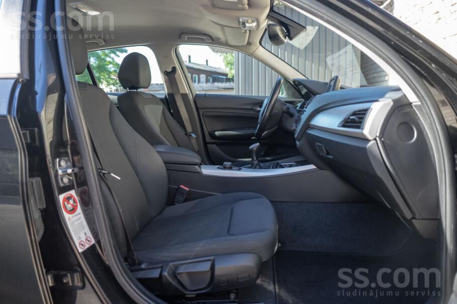 Black BMW 116 2012 in Liepaja, with an engine capacity of 1.60 L and mileage of 307 thousand km for 5900 €, photo 15 on AUTOMOTO.COM.LV