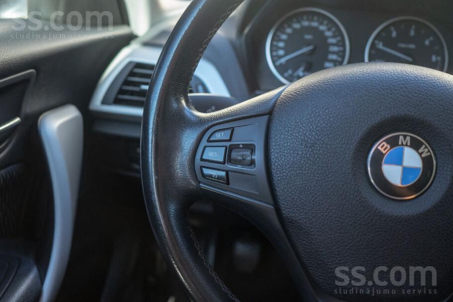 Black BMW 116 2012 in Liepaja, with an engine capacity of 1.60 L and mileage of 307 thousand km for 5900 €, photo 28 on AUTOMOTO.COM.LV