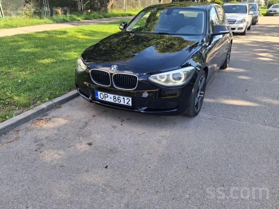 Black BMW 116 2012 in Riga, with an engine capacity of 1.60 L and mileage of 252 thousand km for 5200 €, photo 3 on AUTOMOTO.COM.LV