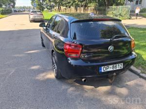 Black BMW 116 2012 in Riga, with an engine capacity of 1.60 L and mileage of 252 thousand km for 5200 €, photo 4 on AUTOMOTO.COM.LV