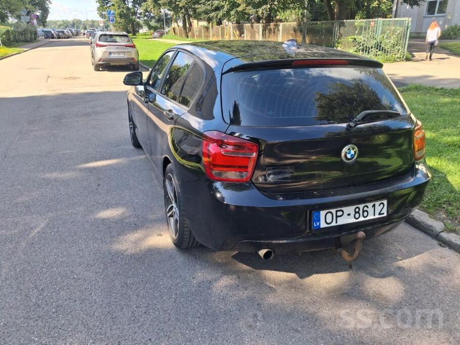 Black BMW 116 2012 in Riga, with an engine capacity of 1.60 L and mileage of 252 thousand km for 5200 €, photo 4 on AUTOMOTO.COM.LV