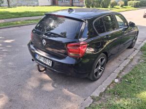 Black BMW 116 2012 in Riga, with an engine capacity of 1.60 L and mileage of 252 thousand km for 5200 €, photo 5 on AUTOMOTO.COM.LV
