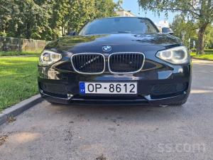 Black BMW 116 2012 in Riga, with an engine capacity of 1.60 L and mileage of 252 thousand km for 5200 €, photo 6 on AUTOMOTO.COM.LV