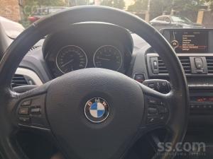 Black BMW 116 2012 in Riga, with an engine capacity of 1.60 L and mileage of 252 thousand km for 5200 €, photo 7 on AUTOMOTO.COM.LV