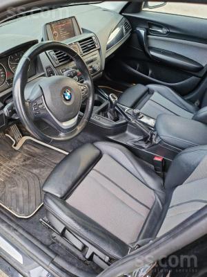 Black BMW 116 2012 in Valmiera, with an engine capacity of 2.00 L and mileage of 224 thousand km for 6300 €, photo 5 on AUTOMOTO.COM.LV