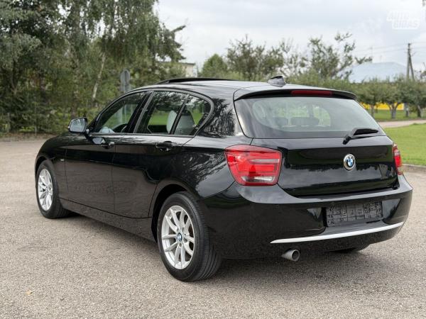 Black BMW 116 2012 in Kaisiadorys, with an engine capacity of 1.60 L and mileage of 243 thousand km for 6600 €, photo 8 on AUTOMOTO.COM.LV