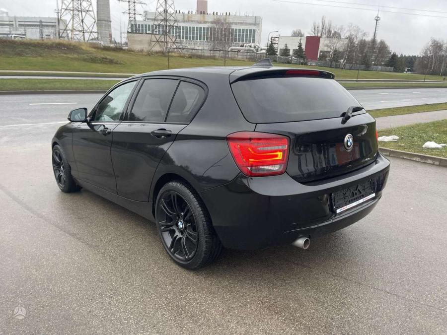 Black BMW 116 2013 in Kaunas, with an engine capacity of 2.00 L and mileage of 268 thousand km for 5950 €, photo 13 on AUTOMOTO.COM.LV