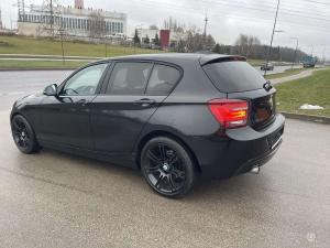 Black BMW 116 2013 in Kaunas, with an engine capacity of 2.00 L and mileage of 268 thousand km for 5950 €, photo 14 on AUTOMOTO.COM.LV