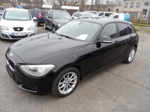 Black BMW 116 2013 in Klaipeda, with an engine capacity of 2.00 L and mileage of 200 thousand km for 6990 €, photo 3 on AUTOMOTO.COM.LV