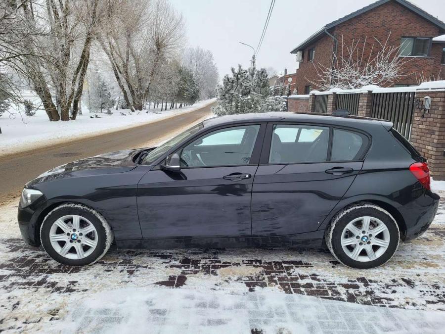 Black BMW 116 2013 in Siauliai, with an engine capacity of 2.00 L and mileage of 214 thousand km for 5450 €, photo 1 on AUTOMOTO.COM.LV