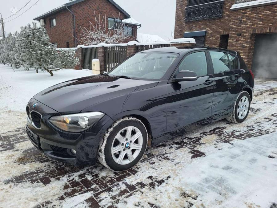 Black BMW 116 2013 in Siauliai, with an engine capacity of 2.00 L and mileage of 214 thousand km for 5450 €, photo 2 on AUTOMOTO.COM.LV