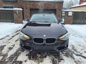Black BMW 116 2013 in Siauliai, with an engine capacity of 2.00 L and mileage of 214 thousand km for 5450 €, photo 3 on AUTOMOTO.COM.LV