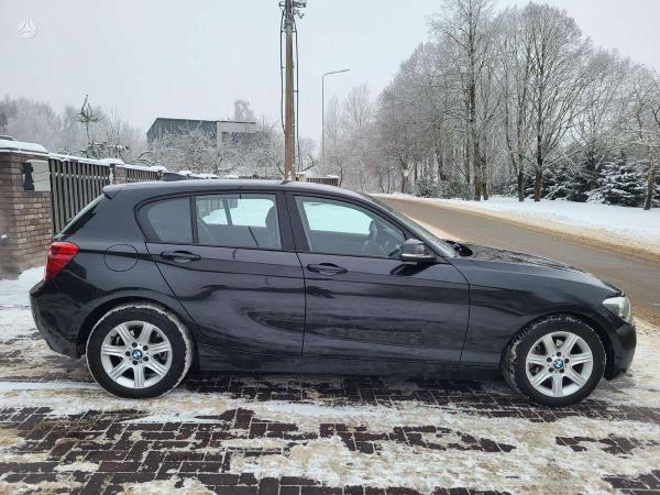 Black BMW 116 2013 in Siauliai, with an engine capacity of 2.00 L and mileage of 214 thousand km for 5450 €, photo 5 on AUTOMOTO.COM.LV