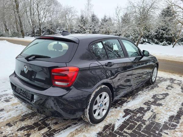 Black BMW 116 2013 in Siauliai, with an engine capacity of 2.00 L and mileage of 214 thousand km for 5450 €, photo 6 on AUTOMOTO.COM.LV