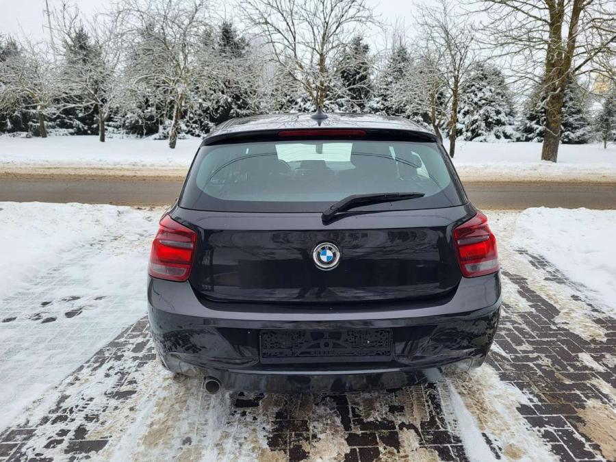 Black BMW 116 2013 in Siauliai, with an engine capacity of 2.00 L and mileage of 214 thousand km for 5450 €, photo 7 on AUTOMOTO.COM.LV