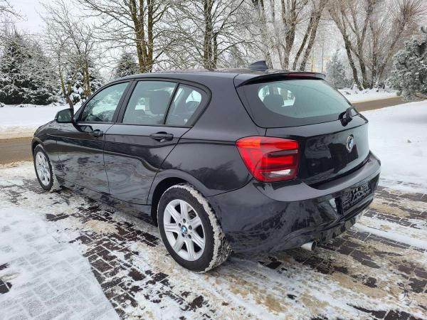 Black BMW 116 2013 in Siauliai, with an engine capacity of 2.00 L and mileage of 214 thousand km for 5450 €, photo 8 on AUTOMOTO.COM.LV
