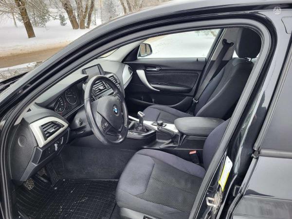 Black BMW 116 2013 in Siauliai, with an engine capacity of 2.00 L and mileage of 214 thousand km for 5450 €, photo 9 on AUTOMOTO.COM.LV
