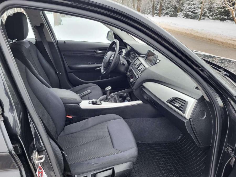 Black BMW 116 2013 in Siauliai, with an engine capacity of 2.00 L and mileage of 214 thousand km for 5450 €, photo 11 on AUTOMOTO.COM.LV