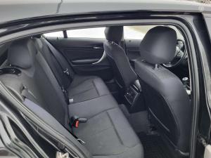 Black BMW 116 2013 in Siauliai, with an engine capacity of 2.00 L and mileage of 214 thousand km for 5450 €, photo 12 on AUTOMOTO.COM.LV