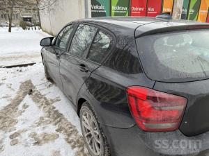 Black BMW 116 2013 in Riga, with an engine capacity of 2.00 L and mileage of 220 thousand km for 4590 €, photo 3 on AUTOMOTO.COM.LV