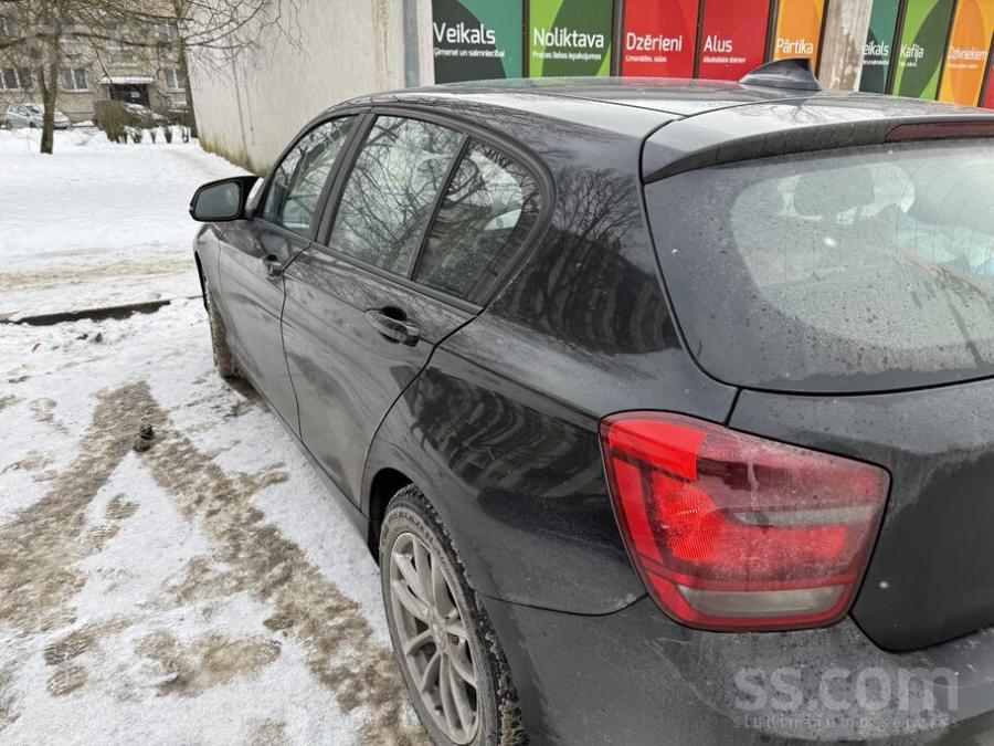 Black BMW 116 2013 in Riga, with an engine capacity of 2.00 L and mileage of 220 thousand km for 4590 €, photo 3 on AUTOMOTO.COM.LV