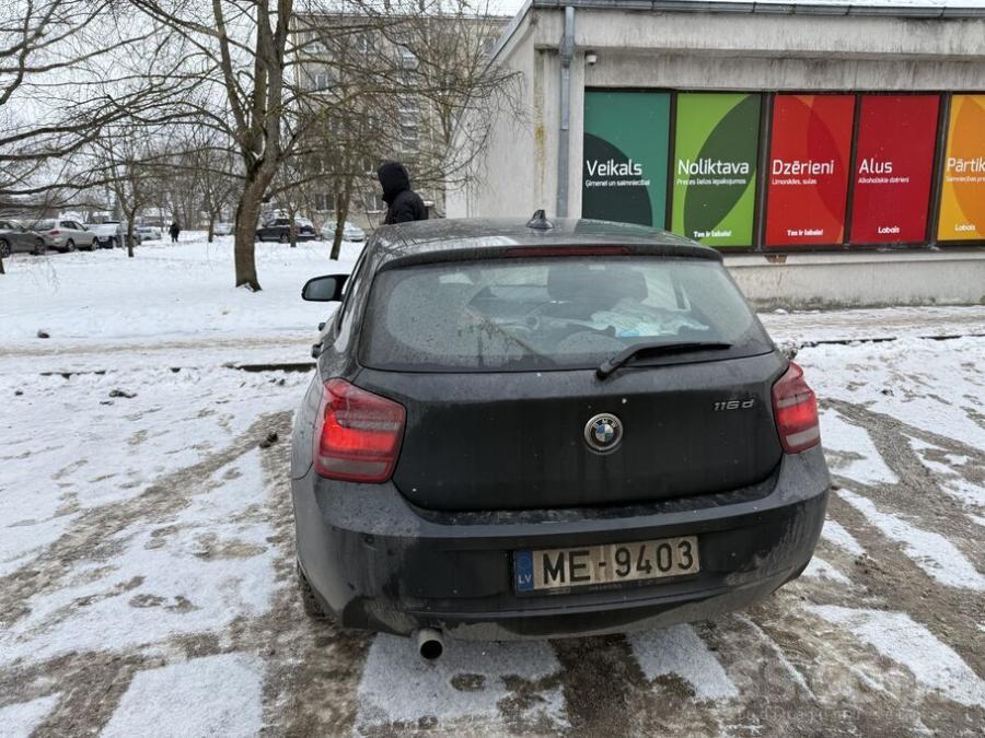 Black BMW 116 2013 in Riga, with an engine capacity of 2.00 L and mileage of 220 thousand km for 4590 €, photo 4 on AUTOMOTO.COM.LV