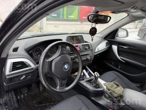 Black BMW 116 2013 in Riga, with an engine capacity of 2.00 L and mileage of 220 thousand km for 4590 €, photo 8 on AUTOMOTO.COM.LV