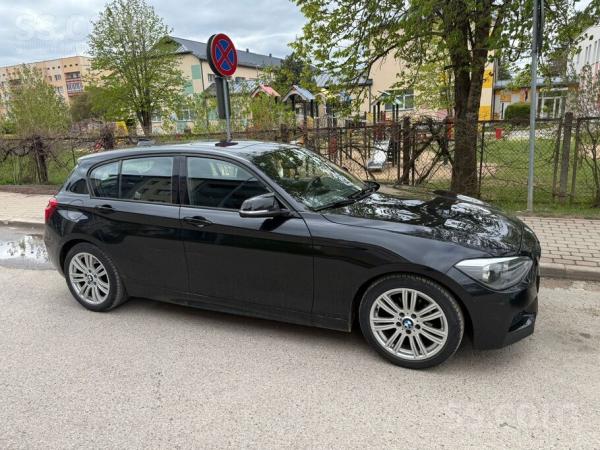 Black BMW 116 2013 in Saldus, with an engine capacity of 1.60 L and mileage of 169 thousand km for 7900 €, photo 1 on AUTOMOTO.COM.LV