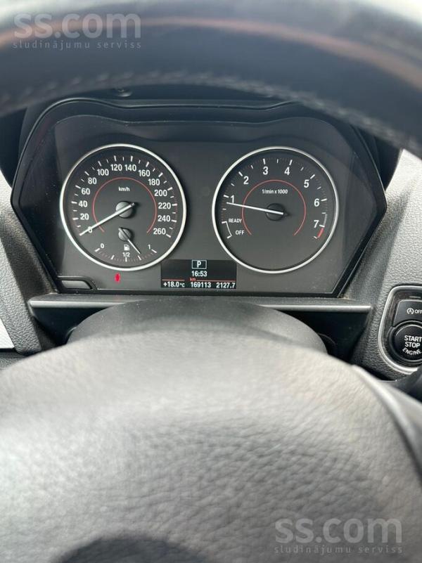 Black BMW 116 2013 in Saldus, with an engine capacity of 1.60 L and mileage of 169 thousand km for 7900 €, photo 3 on AUTOMOTO.COM.LV