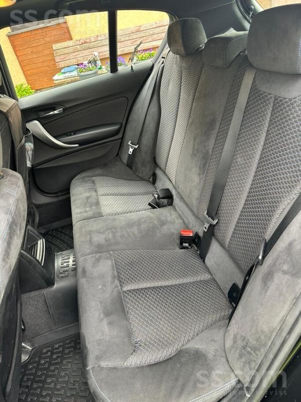 Black BMW 116 2013 in Saldus, with an engine capacity of 1.60 L and mileage of 169 thousand km for 7900 €, photo 6 on AUTOMOTO.COM.LV