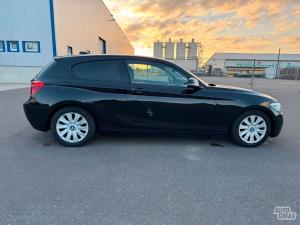 Black BMW 116 2013 in Kaunas, with an engine capacity of 1.60 L and mileage of 195 thousand km for 4199 €, photo 3 on AUTOMOTO.COM.LV