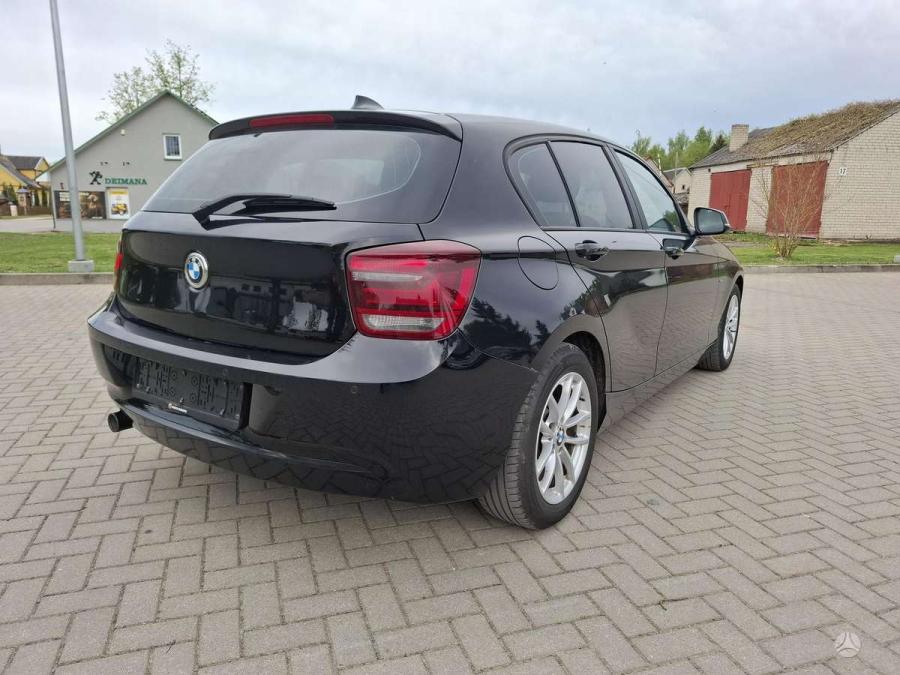 Black BMW 116 2013 in Pasvalys, with an engine capacity of 2.00 L and mileage of 270 thousand km for 5250 €, photo 4 on AUTOMOTO.COM.LV