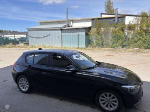 Black BMW 116 2013 in Utena, with an engine capacity of 1.60 L and mileage of 335 thousand km for 4400 €, photo 1 on AUTOMOTO.COM.LV