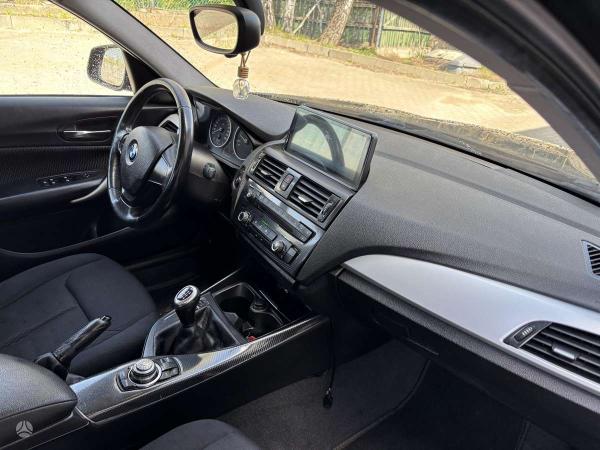 Black BMW 116 2013 in Utena, with an engine capacity of 1.60 L and mileage of 335 thousand km for 4400 €, photo 4 on AUTOMOTO.COM.LV