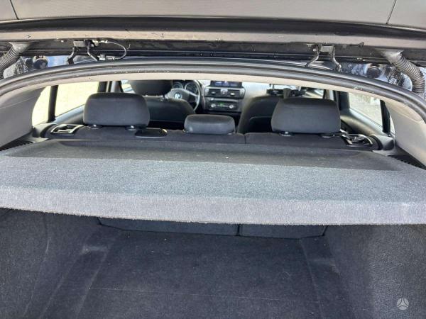 Black BMW 116 2013 in Utena, with an engine capacity of 1.60 L and mileage of 335 thousand km for 4400 €, photo 5 on AUTOMOTO.COM.LV