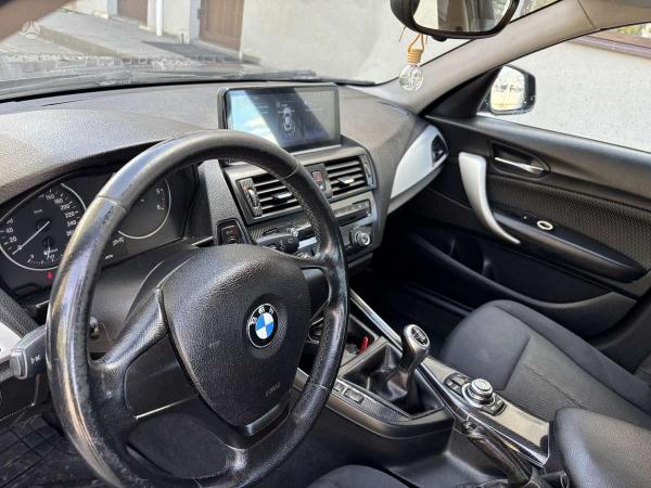 Black BMW 116 2013 in Utena, with an engine capacity of 1.60 L and mileage of 335 thousand km for 4400 €, photo 6 on AUTOMOTO.COM.LV