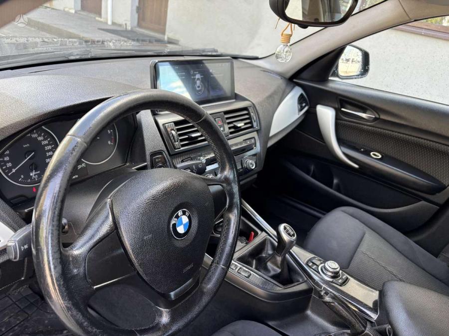 Black BMW 116 2013 in Utena, with an engine capacity of 1.60 L and mileage of 335 thousand km for 4400 €, photo 7 on AUTOMOTO.COM.LV