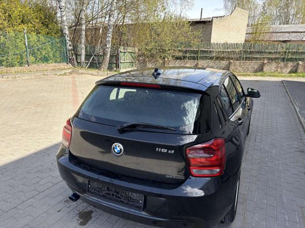 Black BMW 116 2013 in Utena, with an engine capacity of 1.60 L and mileage of 335 thousand km for 4400 €, photo 7 on AUTOMOTO.COM.LV