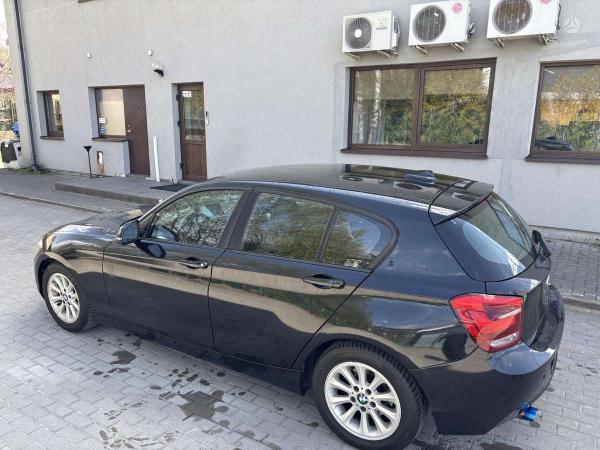 Black BMW 116 2013 in Utena, with an engine capacity of 1.60 L and mileage of 335 thousand km for 4400 €, photo 9 on AUTOMOTO.COM.LV