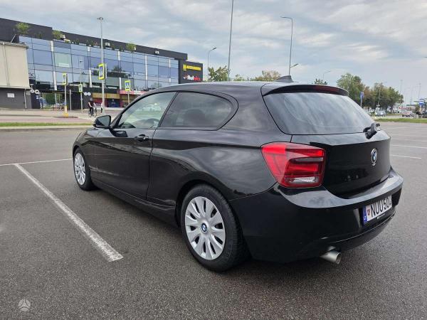 Black BMW 116 2013 in Kaunas, with an engine capacity of 1.60 L and mileage of 195 thousand km for 5200 €, photo 6 on AUTOMOTO.COM.LV