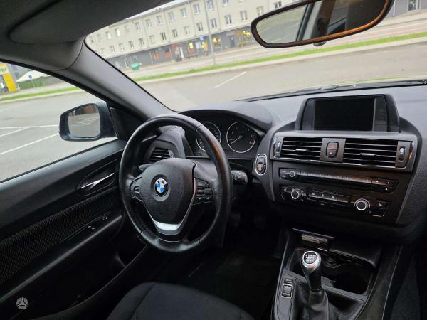 Black BMW 116 2013 in Kaunas, with an engine capacity of 1.60 L and mileage of 195 thousand km for 5200 €, photo 8 on AUTOMOTO.COM.LV
