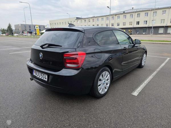 Black BMW 116 2013 in Kaunas, with an engine capacity of 1.60 L and mileage of 195 thousand km for 5200 €, photo 9 on AUTOMOTO.COM.LV