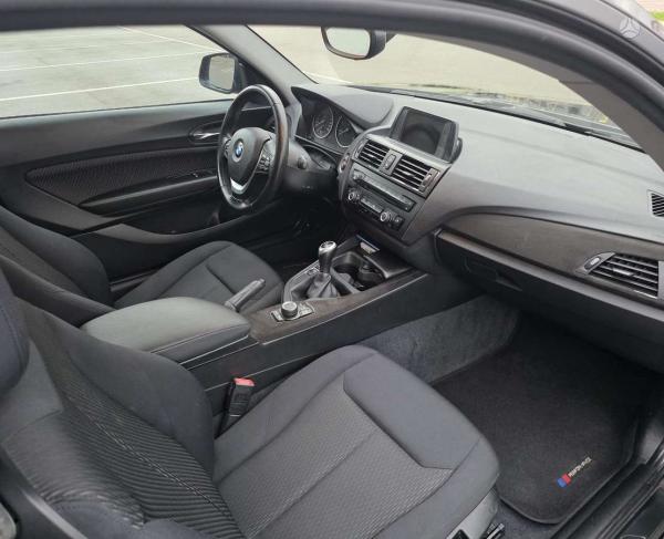 Black BMW 116 2013 in Kaunas, with an engine capacity of 1.60 L and mileage of 195 thousand km for 5200 €, photo 10 on AUTOMOTO.COM.LV